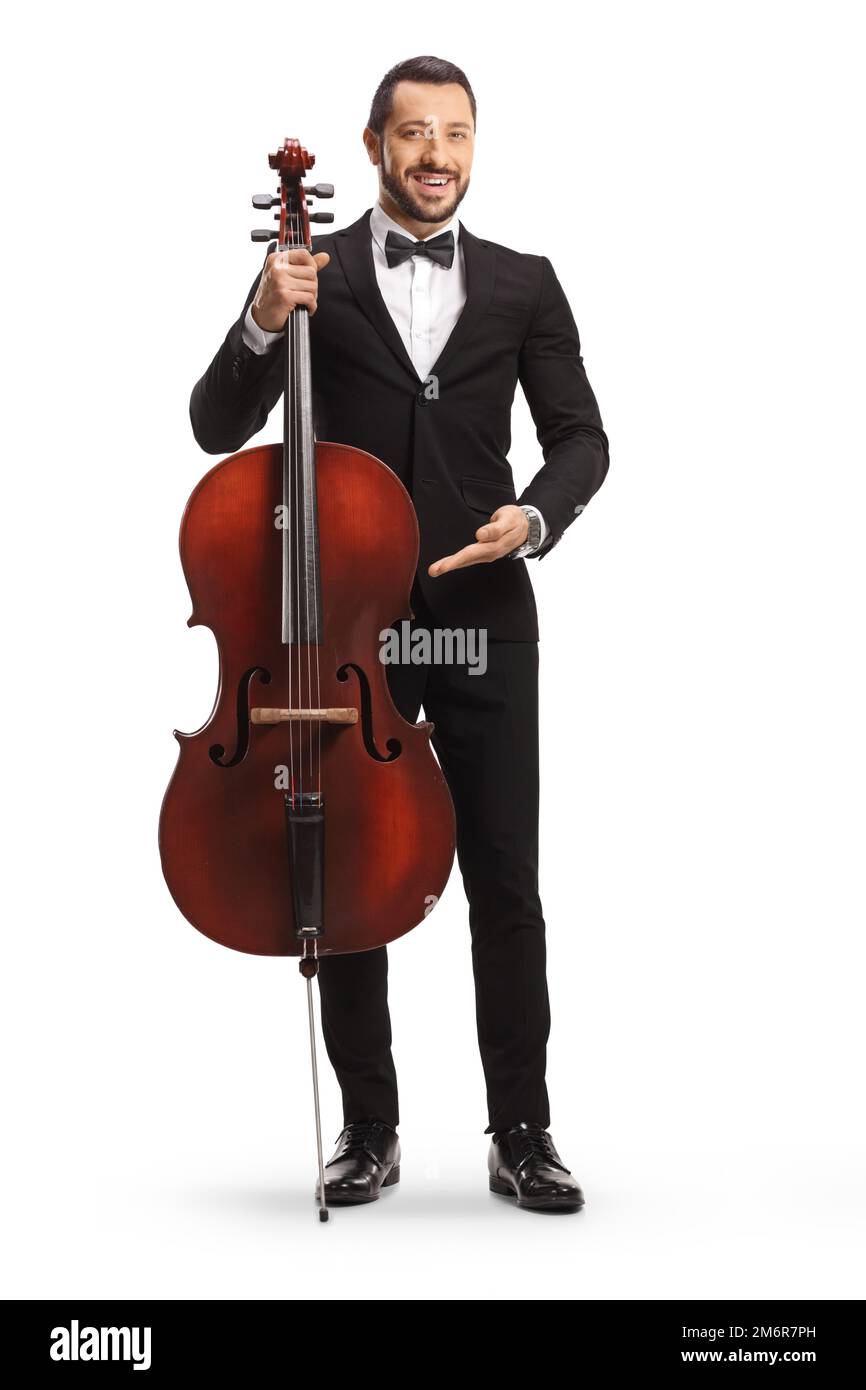 Full length portrait of a male artist posing with a cello isolated on ...