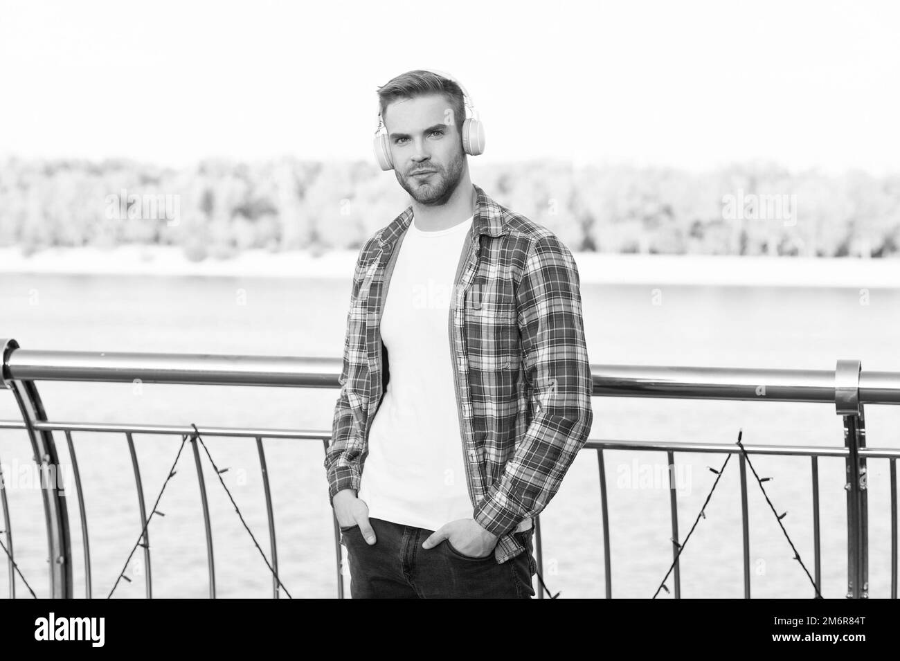 modern life. handsome man in casual checkered shirt Stock Photo - Alamy
