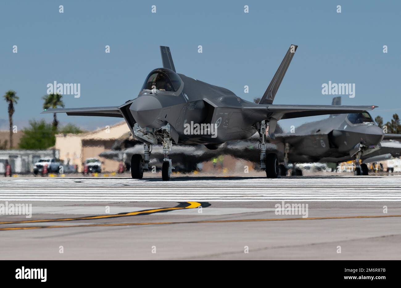 A pair of Royal Australian Air Force (RAAF) F-35As taxi out for a ...