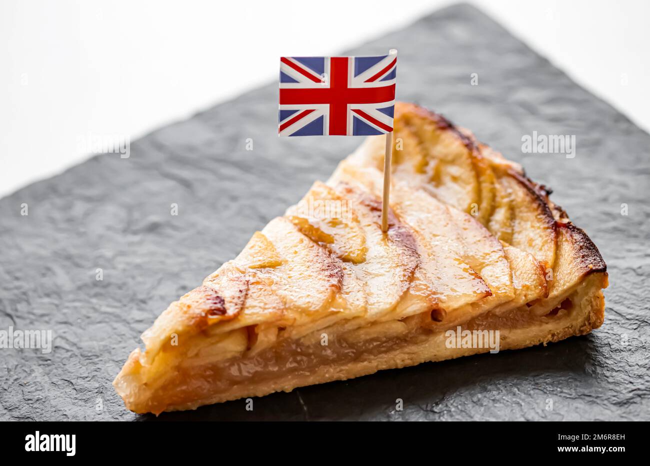 United Kingdom, dessert and bakery, slice of apple tart with British ...