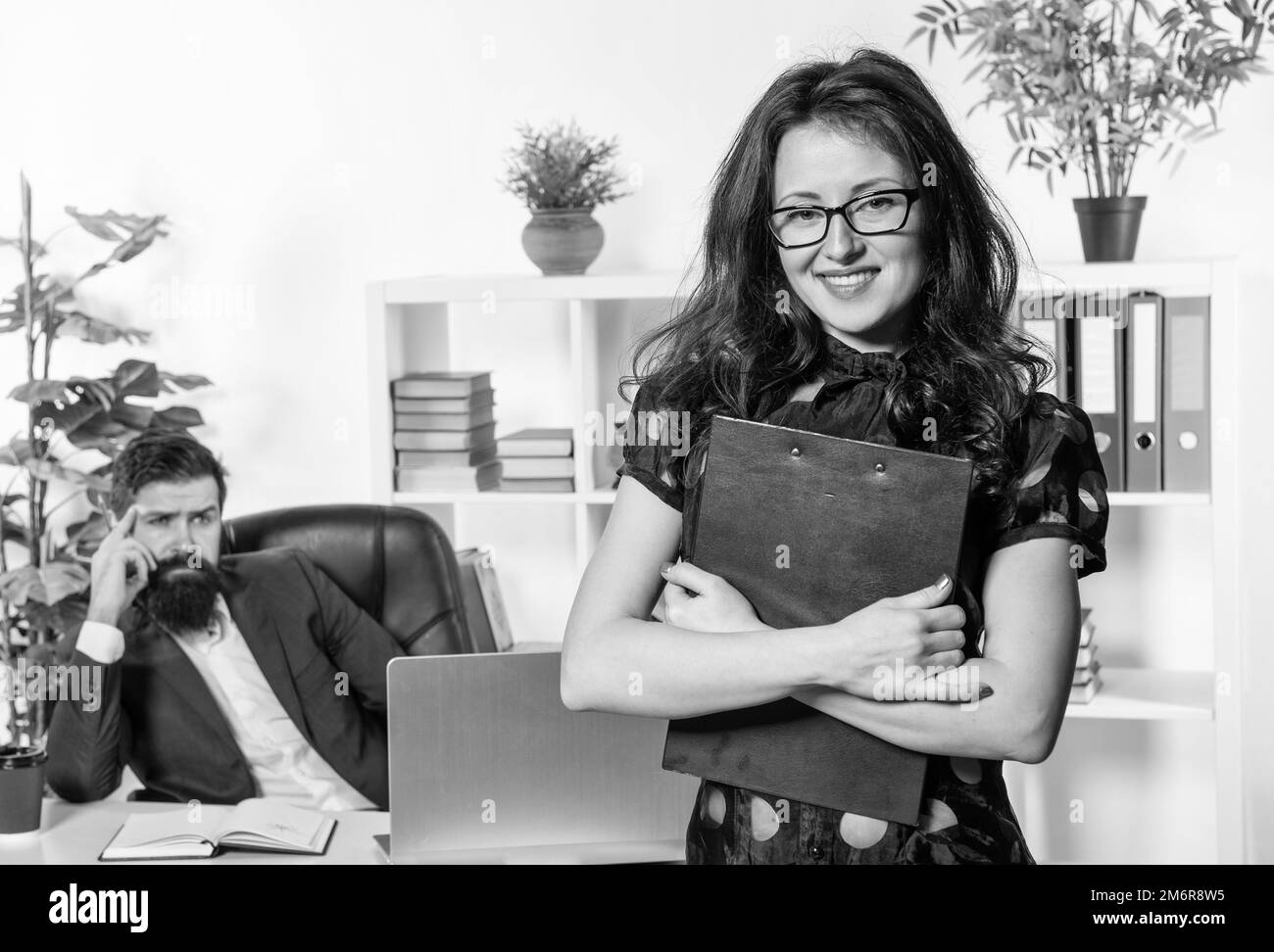 Happy career woman in formalwear stand in front of boss working in ...