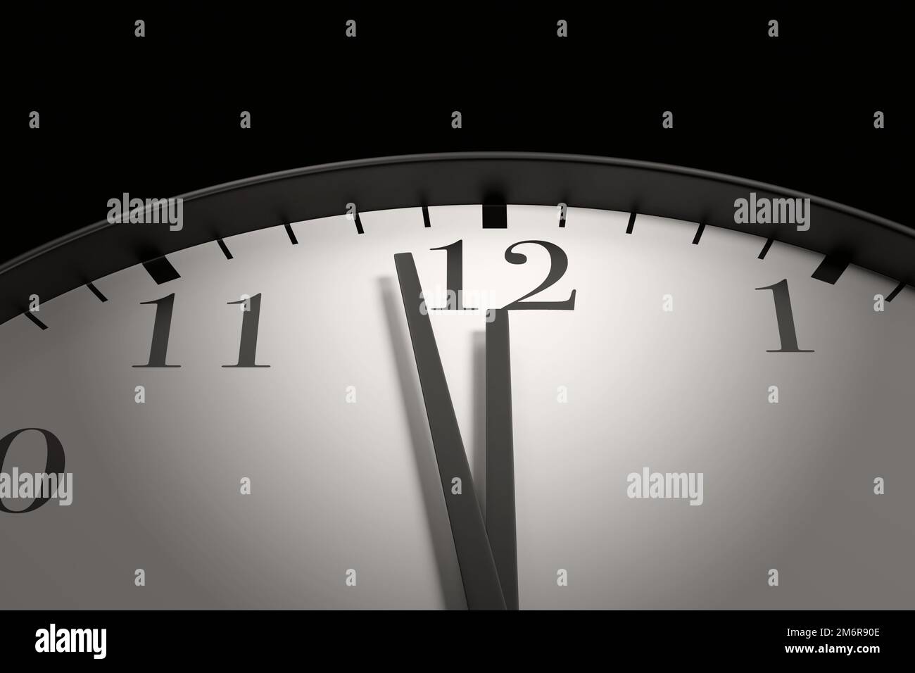 Round black and white clock with both the hour arm and minute arm ...