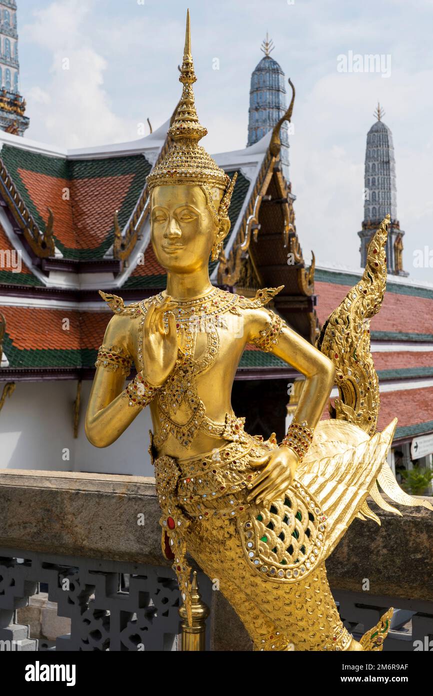 The Statue of Kinnara at Grand Palace in Bangkok, Thailand Stock Photo ...
