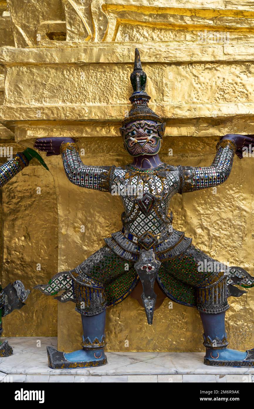 The Statues of demon guardians at Grand Palace in Bangkok, Thailand ...