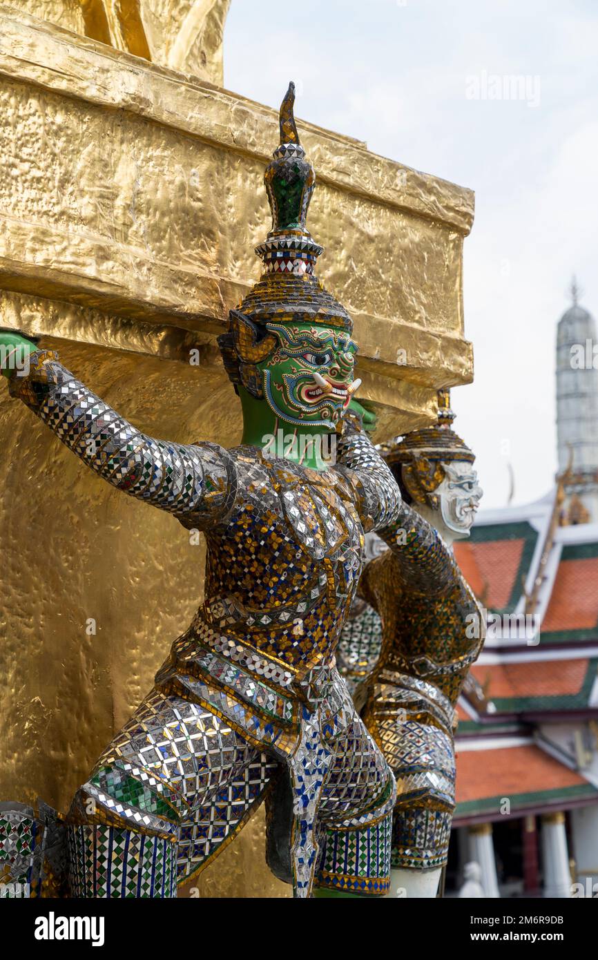 The Statues of demon guardians at Grand Palace in Bangkok, Thailand ...