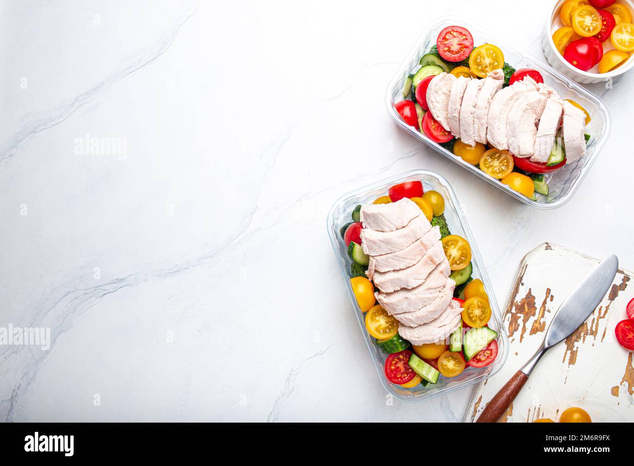 Meal prep lunch boxes containers with chicken and salad top view Stock ...