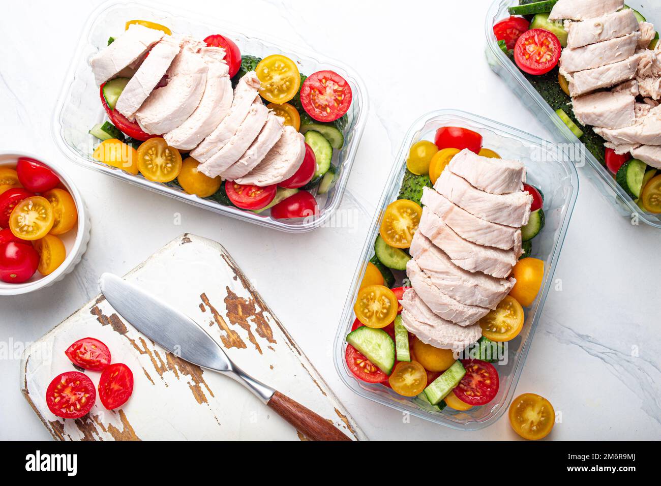 Meal prep lunch boxes containers with chicken and salad top view Stock ...