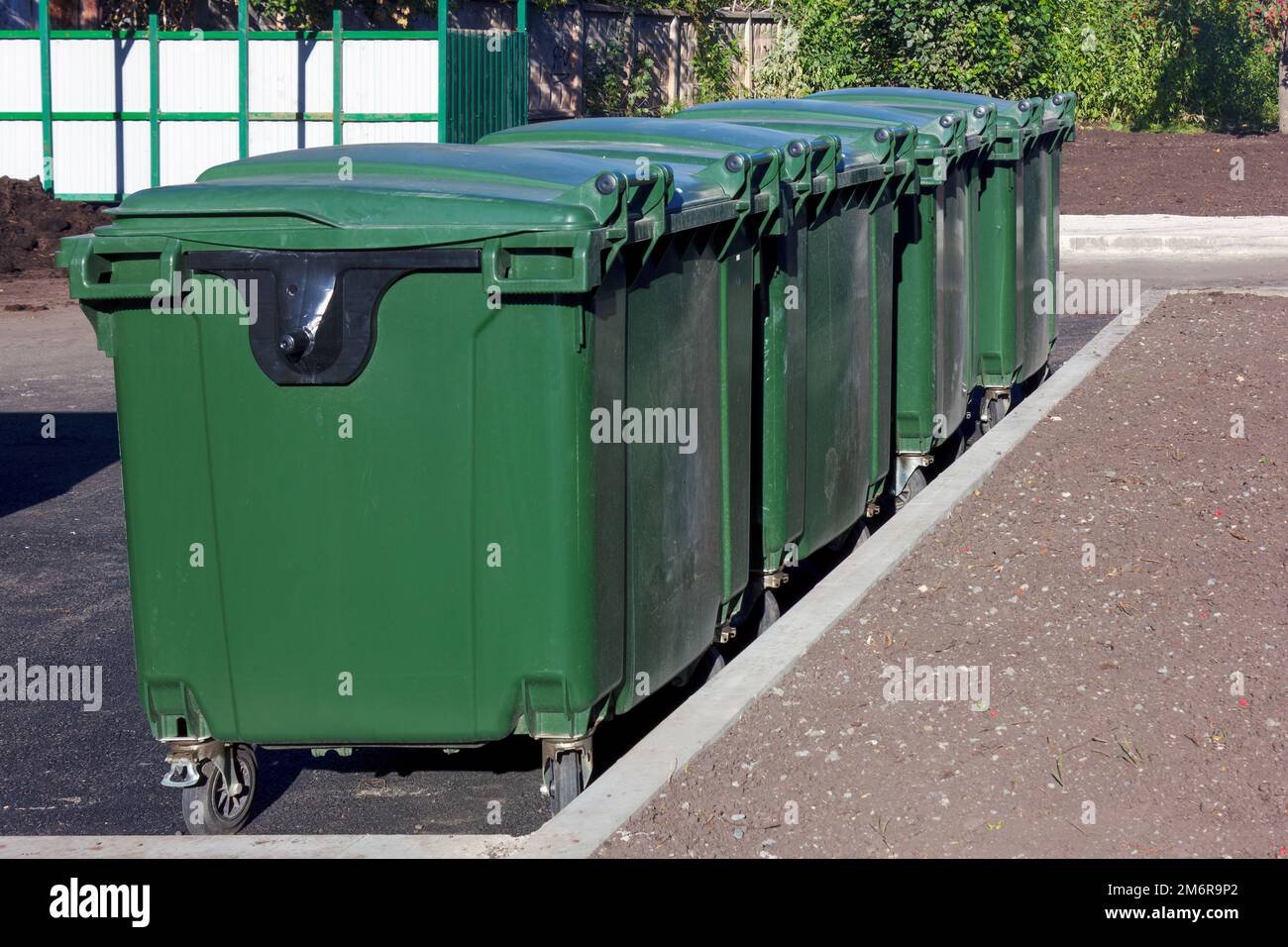 Garbage containers. Plastic garbage containers in the yard of the house ...