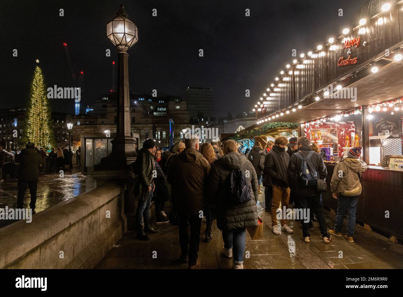 Christmas shoppers make their way through the Xmas Markets on Trafalgar ...