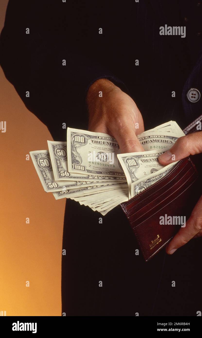 Fifty dollar bill hands hi-res stock photography and images - Alamy