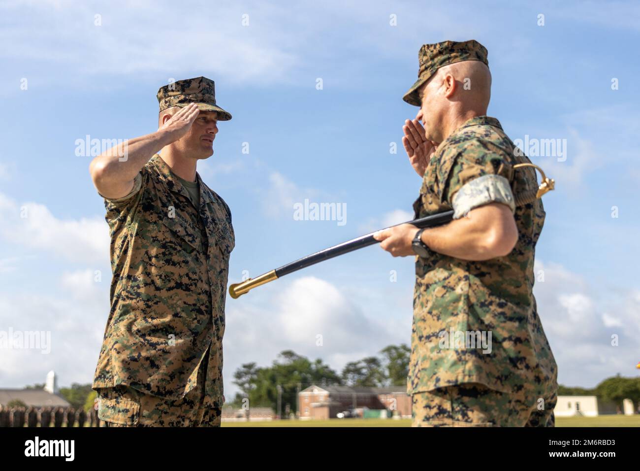 U.S. Marine Corps Sgt. Maj. Clifford P. Fincham (left), the incoming ...