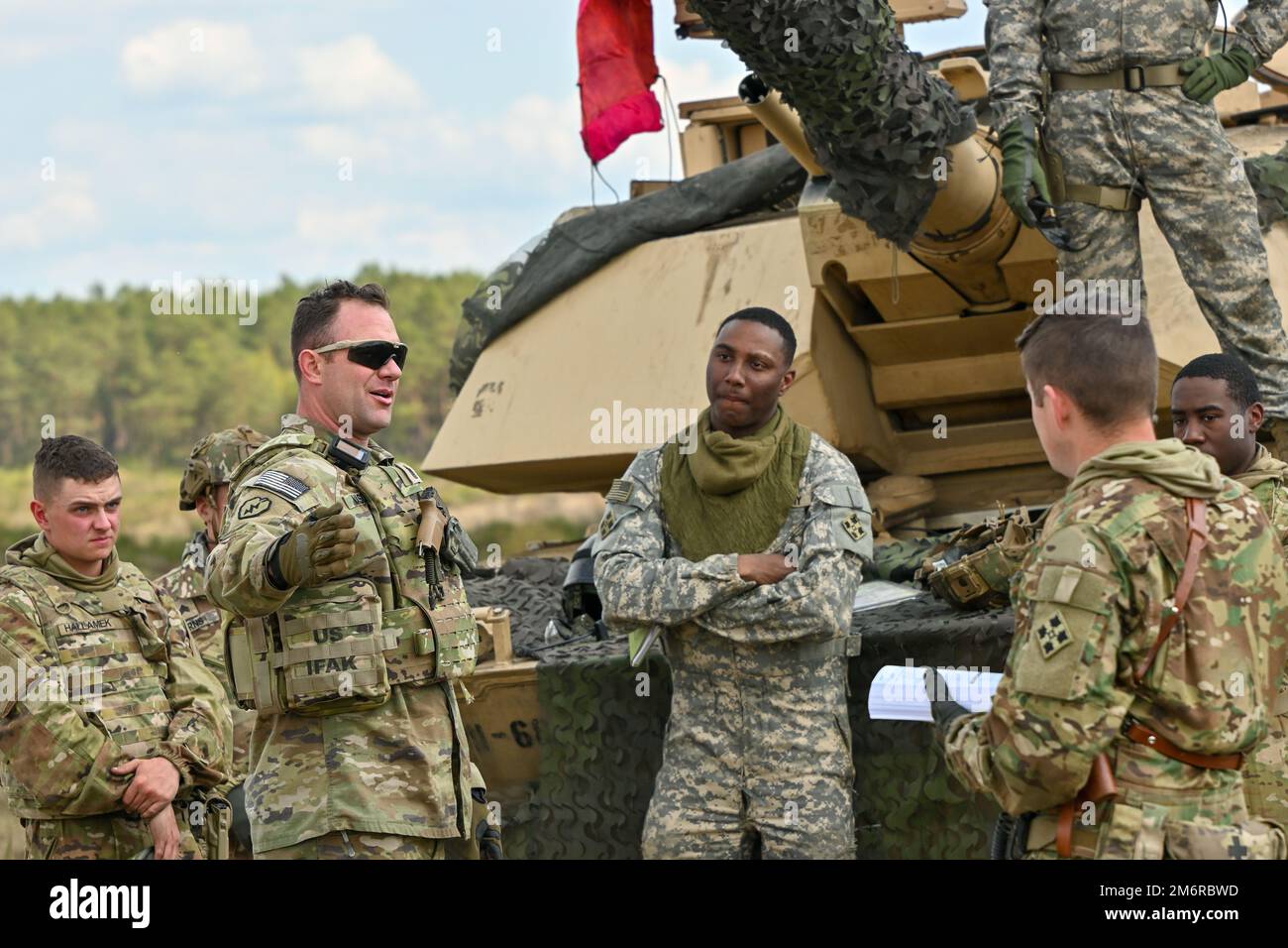 Company leadership provides feedback while Soldiers with 1st Battalion ...