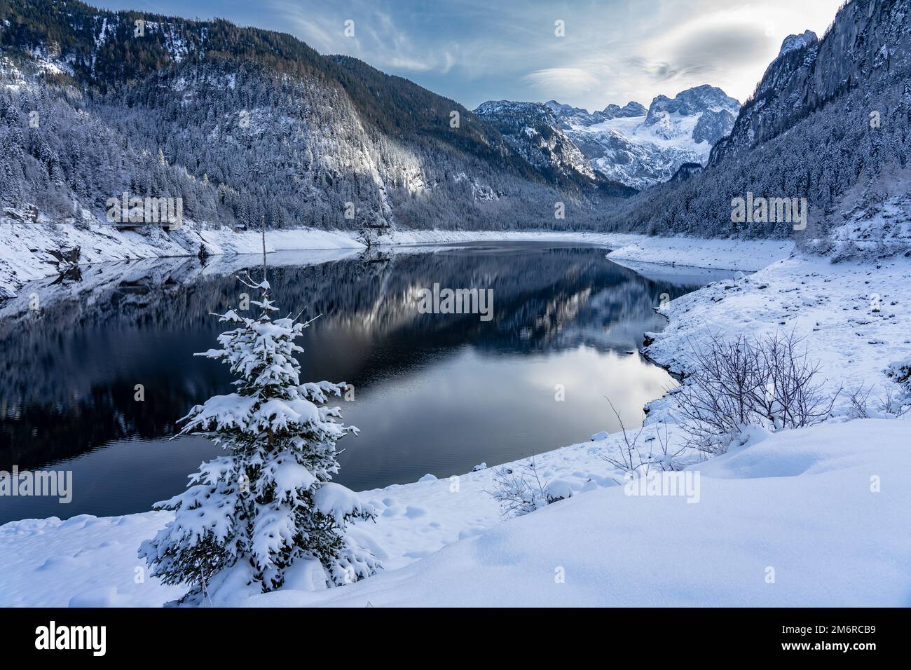 Beautiful snowy winter landscape with Dachstein mountain and Gosausee in Austria near Hallstatt ...
