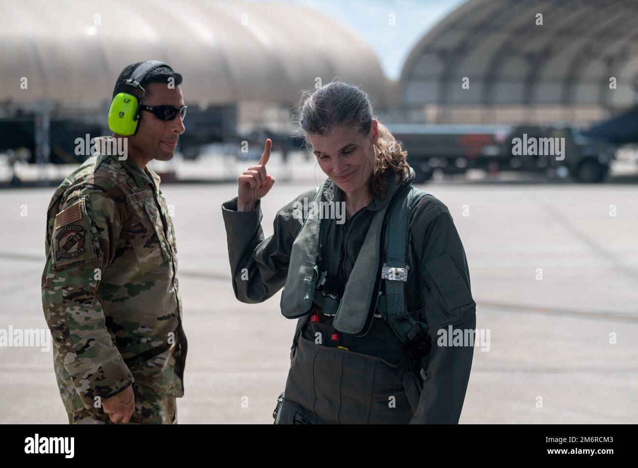 Col. Leah Fry, 4th Maintenance Group commander, talks to an Airman ...