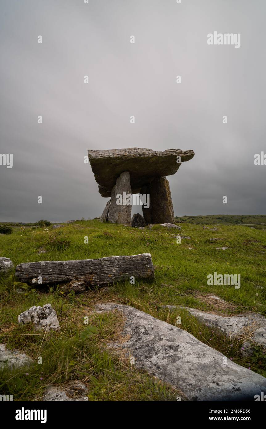 A long exposure view of the Poulnabrone Dolmen under an overcast sky in ...
