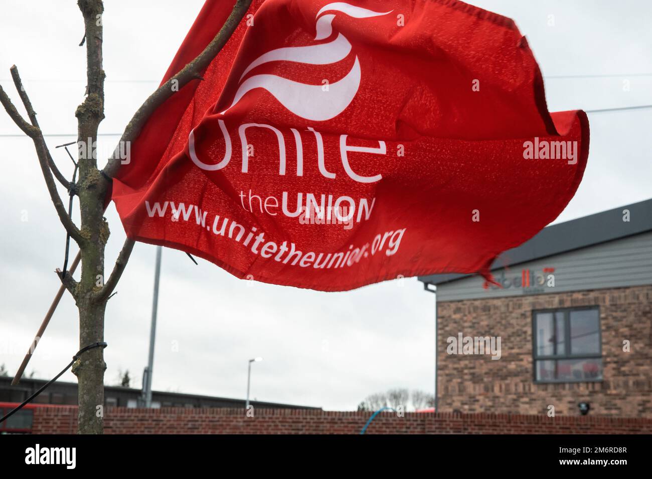 London, UK. 5th January, 2023. A Unite trade union flag is pictured ...