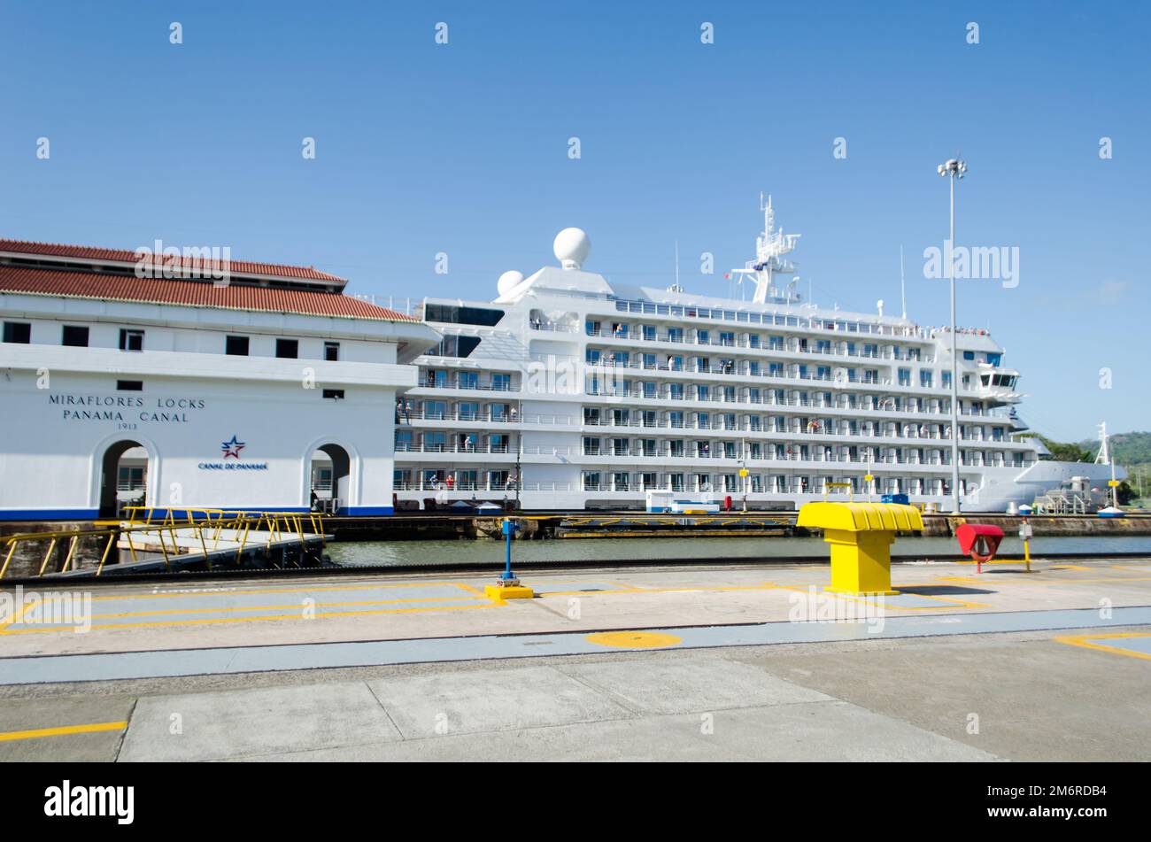Cruise ship passing through the Miraflores Locks in the Panama Canal ...