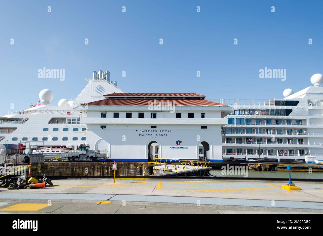 Cruise ship passing through the Miraflores Locks in the Panama Canal ...