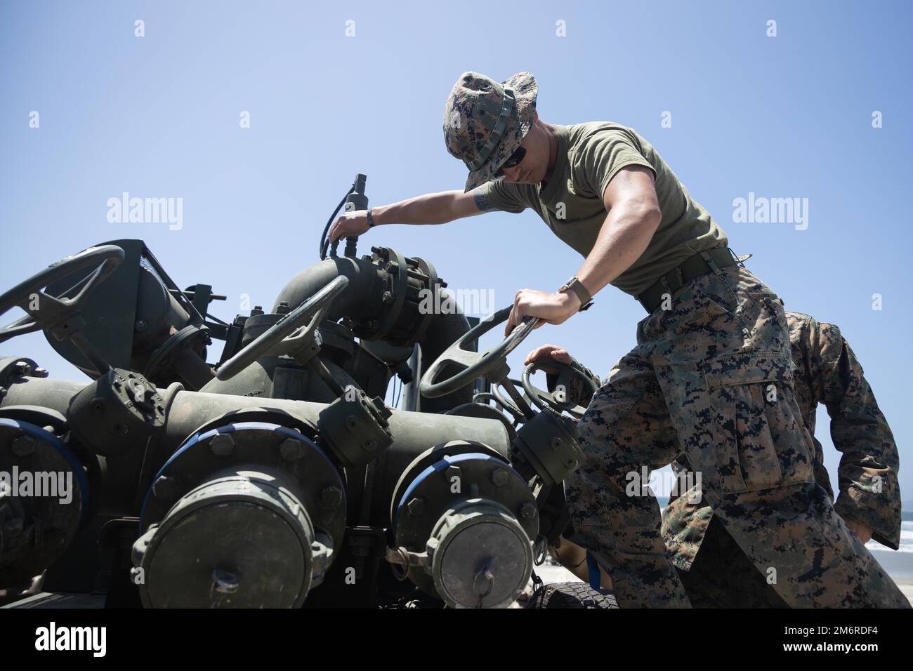 U.S. Marine Corps Benjamin McDonald, a bulk fuel specialist with Bulk ...