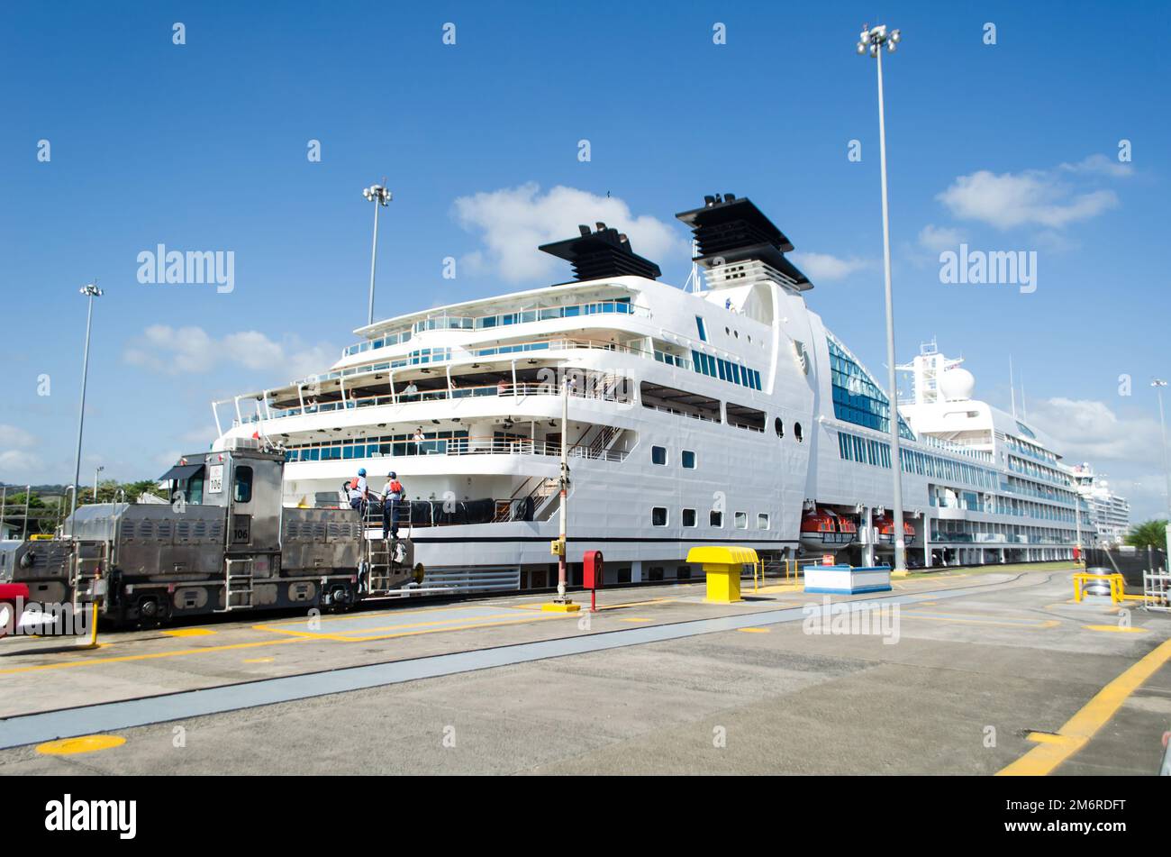 Cruise ship passing through the Miraflores Locks in the Panama Canal ...