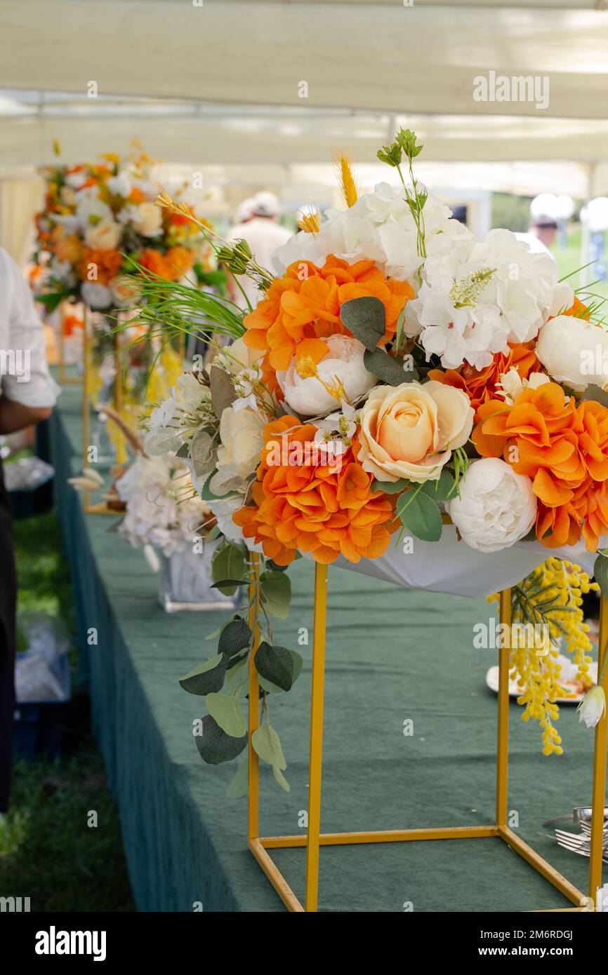 decor of different colors on the catering table Stock Photo - Alamy