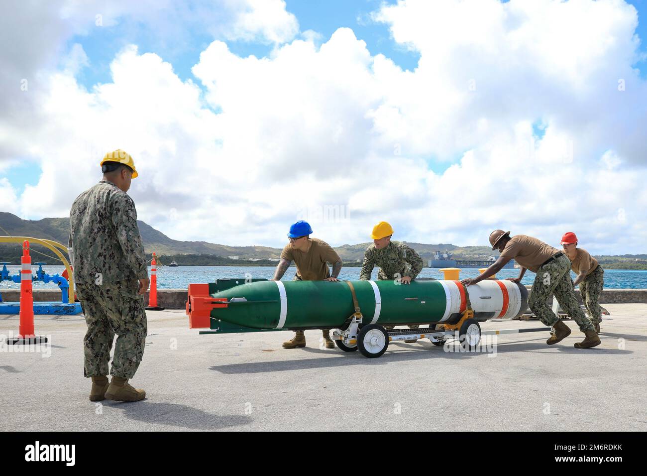 APRA HARBOR, Guam -- Sailors assigned to the Los Angeles-class fast ...