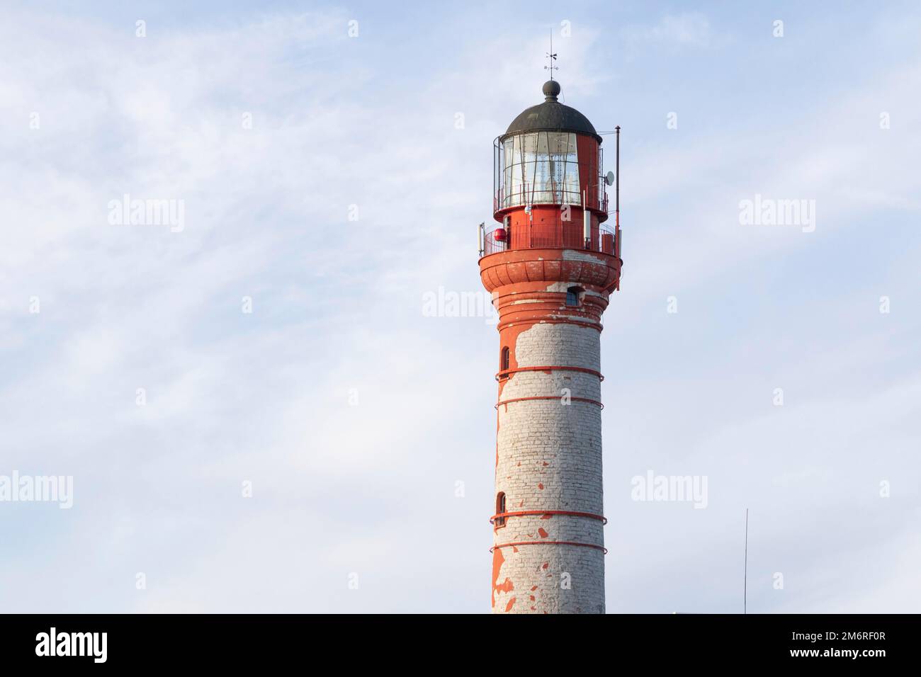 Weathered lighthouse in the evening light on Pakri Peninsula, Paldiski ...