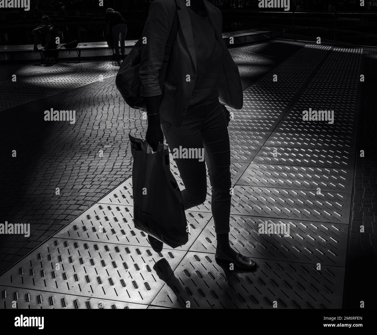 Black and white. Woman with shopping bag, Berlin, Germany Stock Photo ...