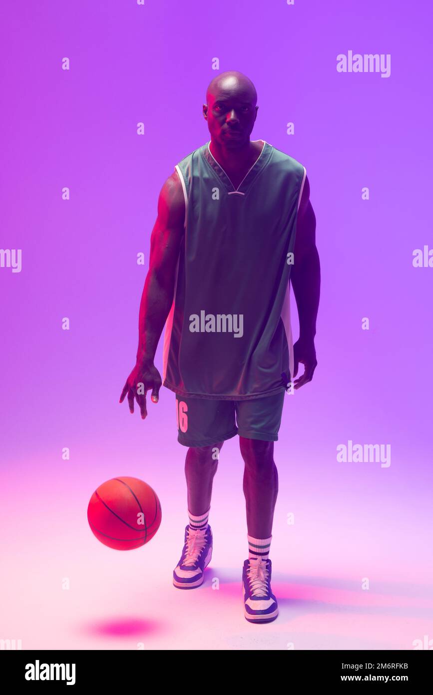 Basketball player bouncing ball african hi-res stock photography and ...