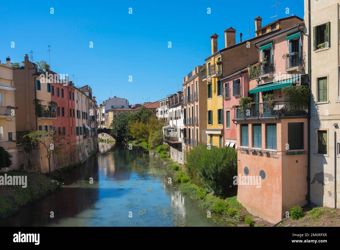 Padua Old Town, view of colorful medieval houses along the Bacchiglione ...