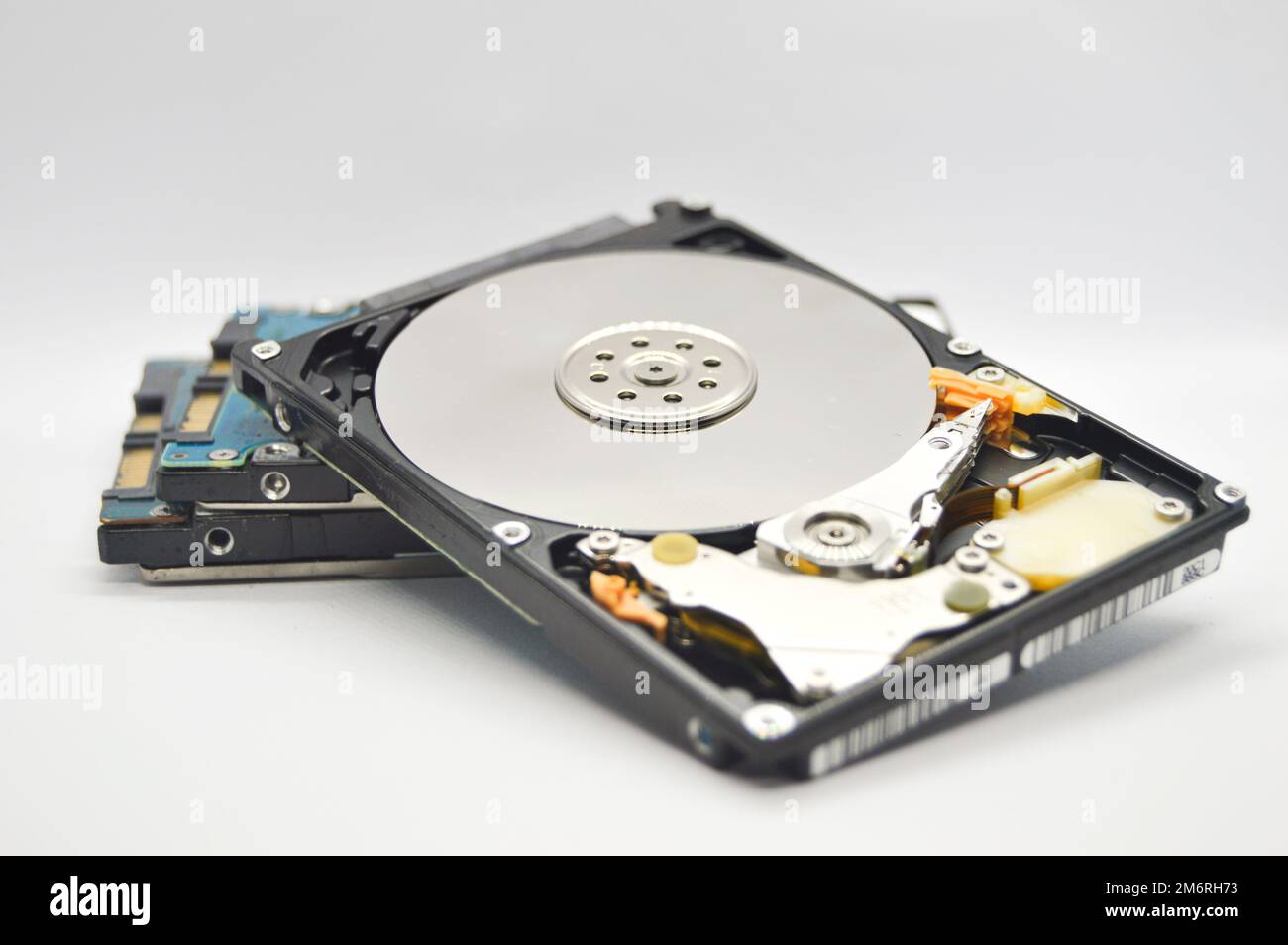 2.5-inch spinning disk type hard drive images are still commonly used ...