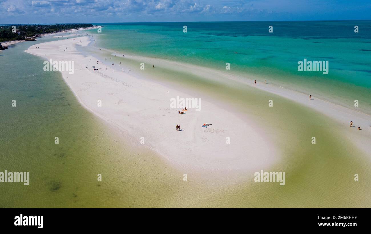 Aerial of the turquoise waters and white sands of Holbox island ...