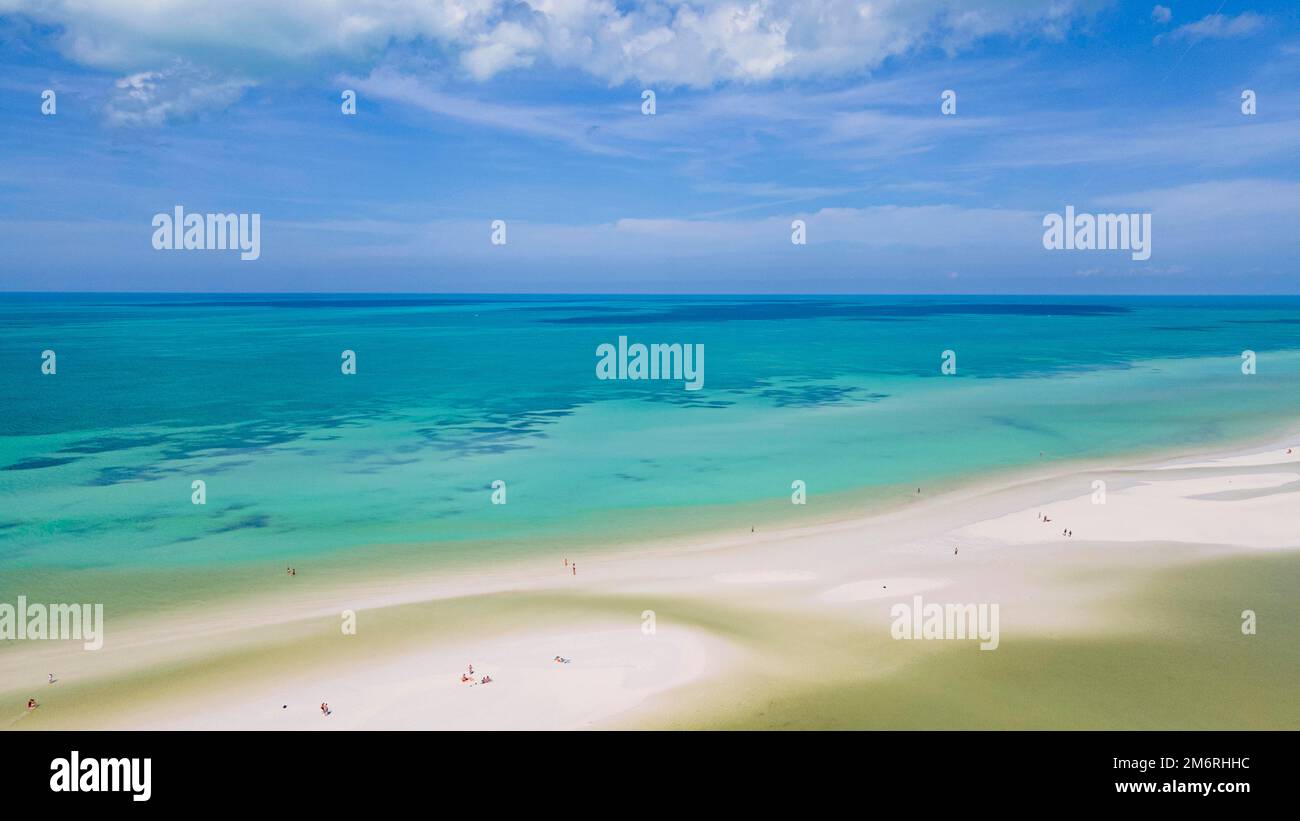 Aerial of the turquoise waters and white sands of Holbox island ...