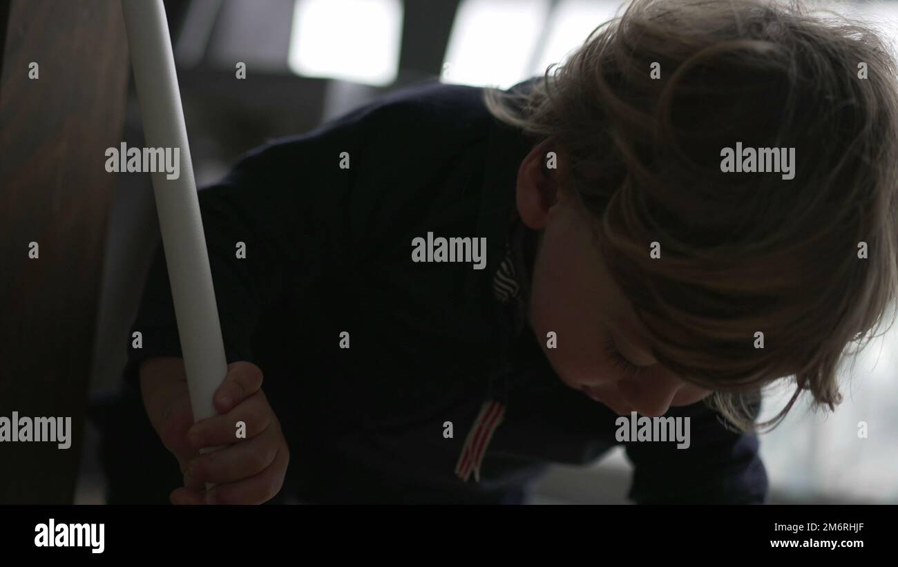 Child getting up from floor. Toddler two year old baby gets up Stock ...