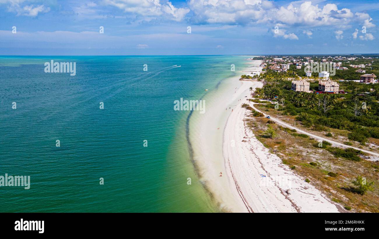 Aerial of the turquoise waters and white sands of Holbox island ...