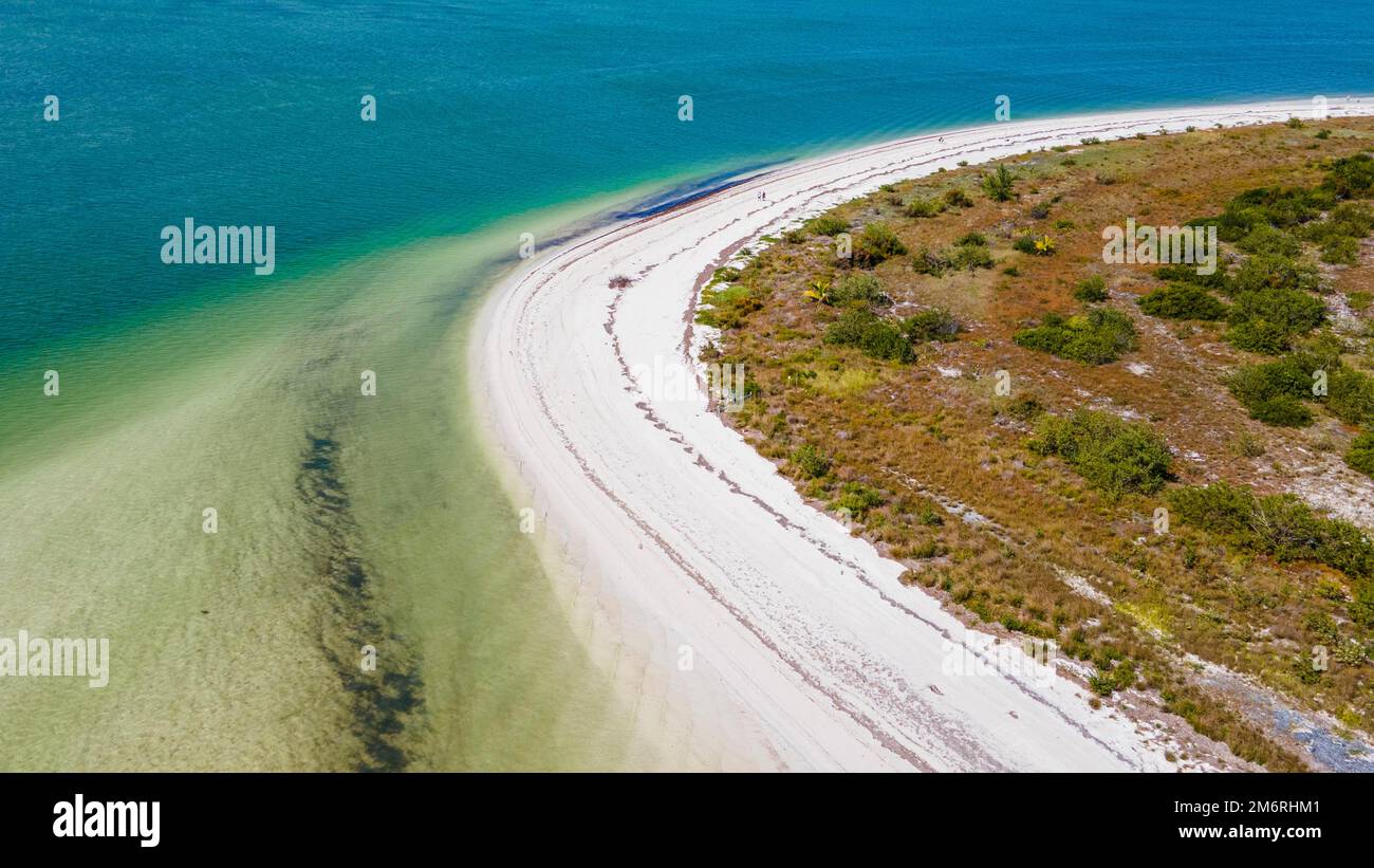 Aerial of the turquoise waters and white sands of Holbox island ...