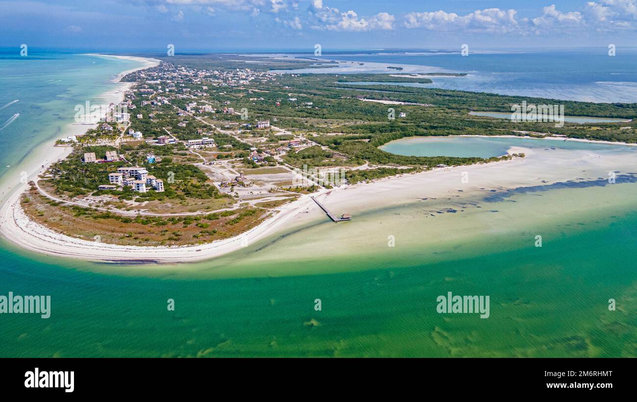 Aerial of the turquoise waters and white sands of Holbox island ...