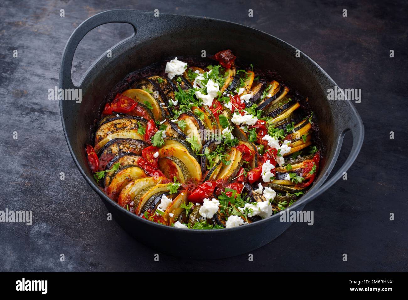 Modern style traditional Greek briam with sliced vegetable Stock Photo ...