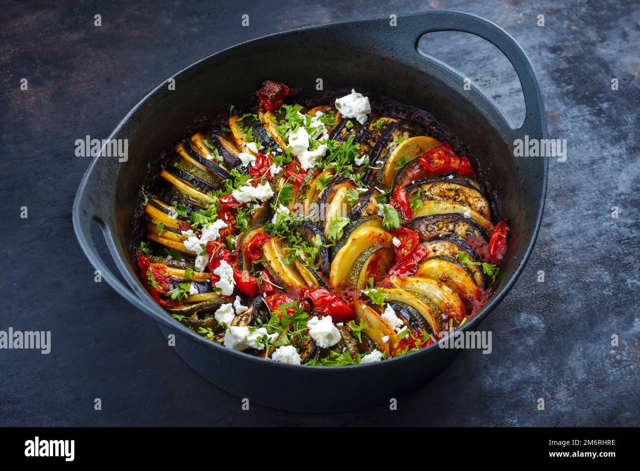 Modern style traditional Greek briam with sliced vegetable Stock Photo ...