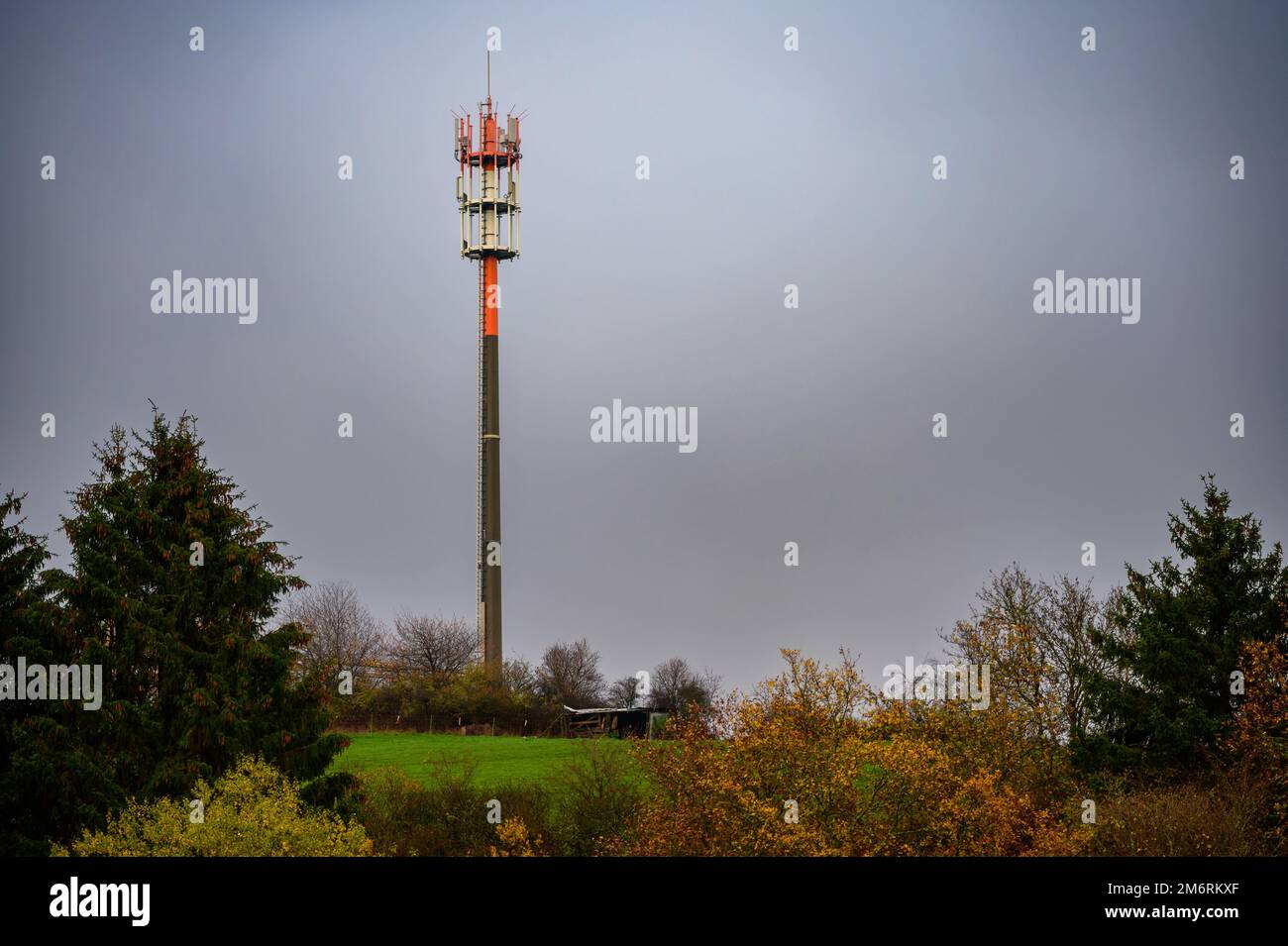 Tall telecommunications and 5G cell tower with microwave antennas in ...
