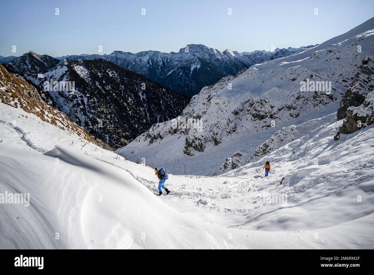 Climbers in the snow, hiking trail in winter, path to Ammergauer ...