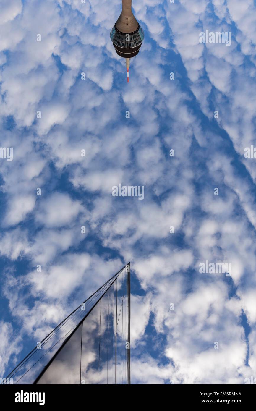 The Rhine Tower and the glass facade of the City Gate, Duesseldorf ...