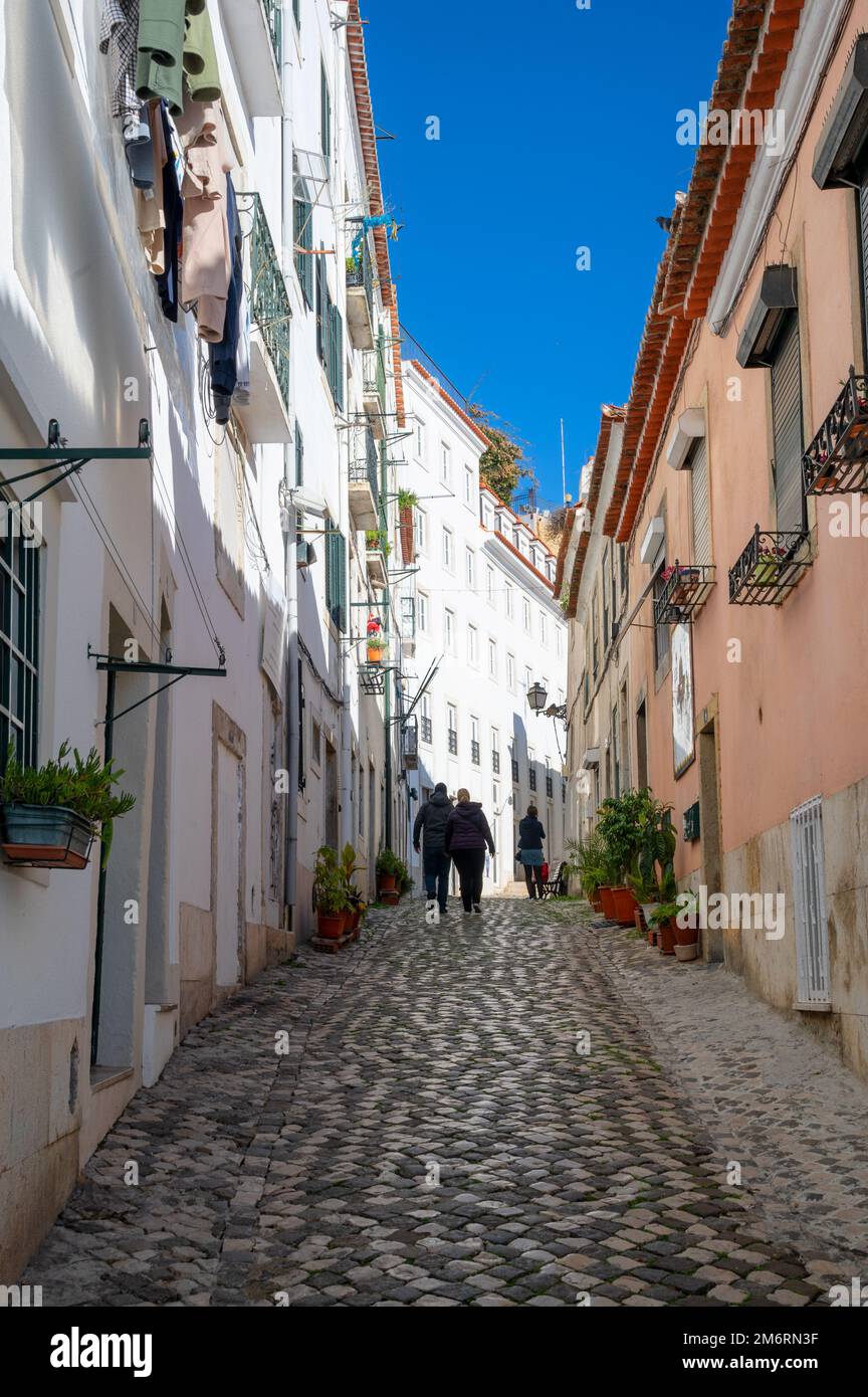 Beautiful narrow cobblestone streets along with traditional colored ...