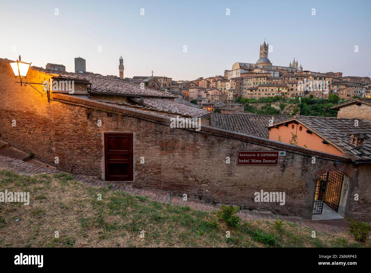 Siena Cathedral at sunrise, Gothic architectural style, in front of it ...
