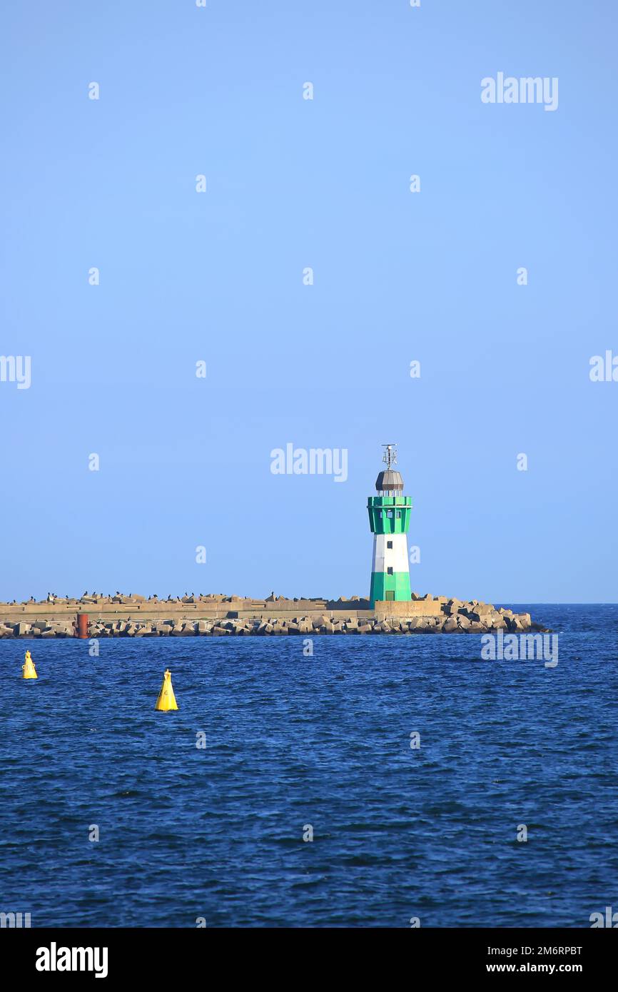 The Mukran lighthouse on the Baltic Sea island of Ruegen. Mecklenburg ...