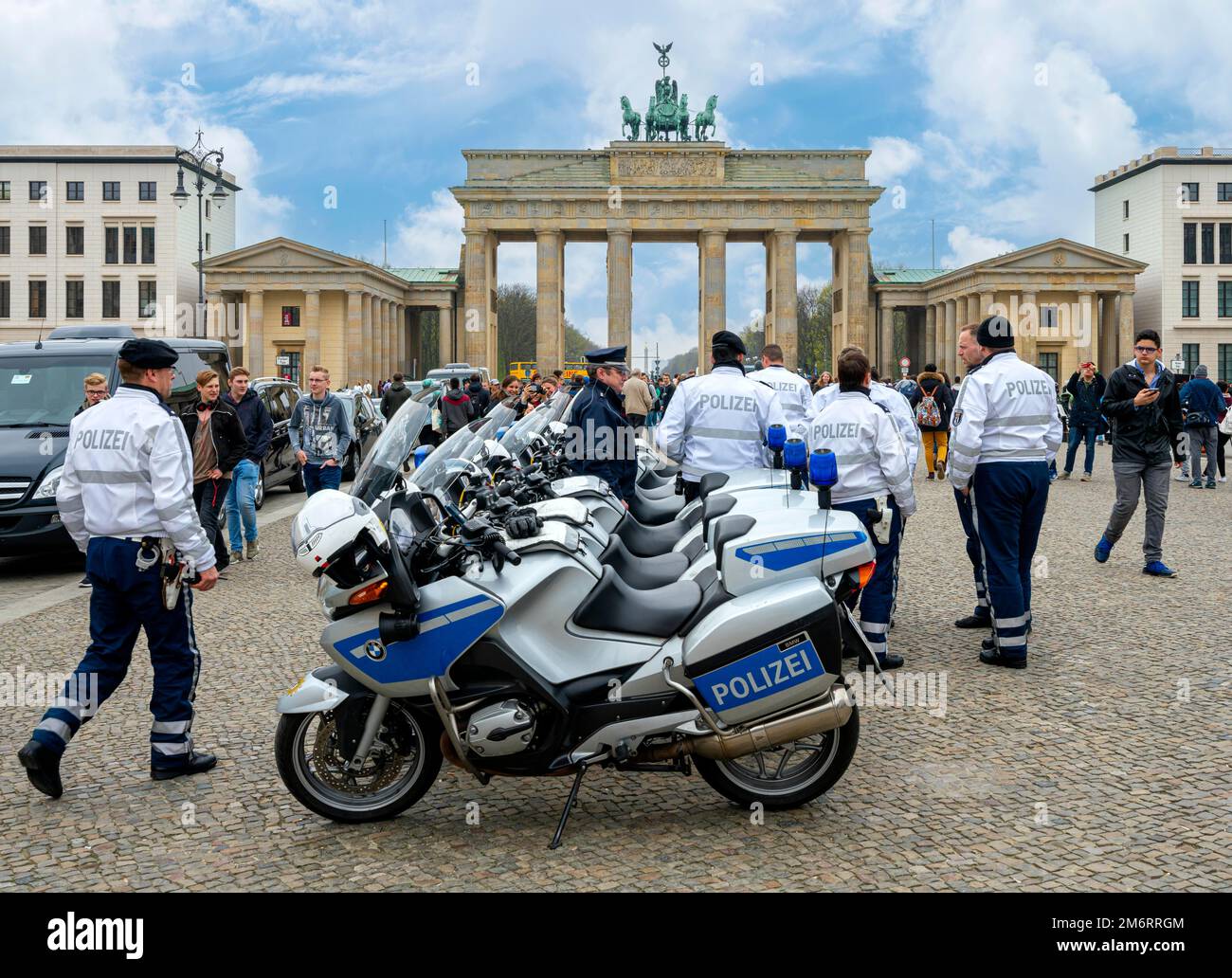 Berlin police motorbike squad stands in front of the Brandenburg Gate ...