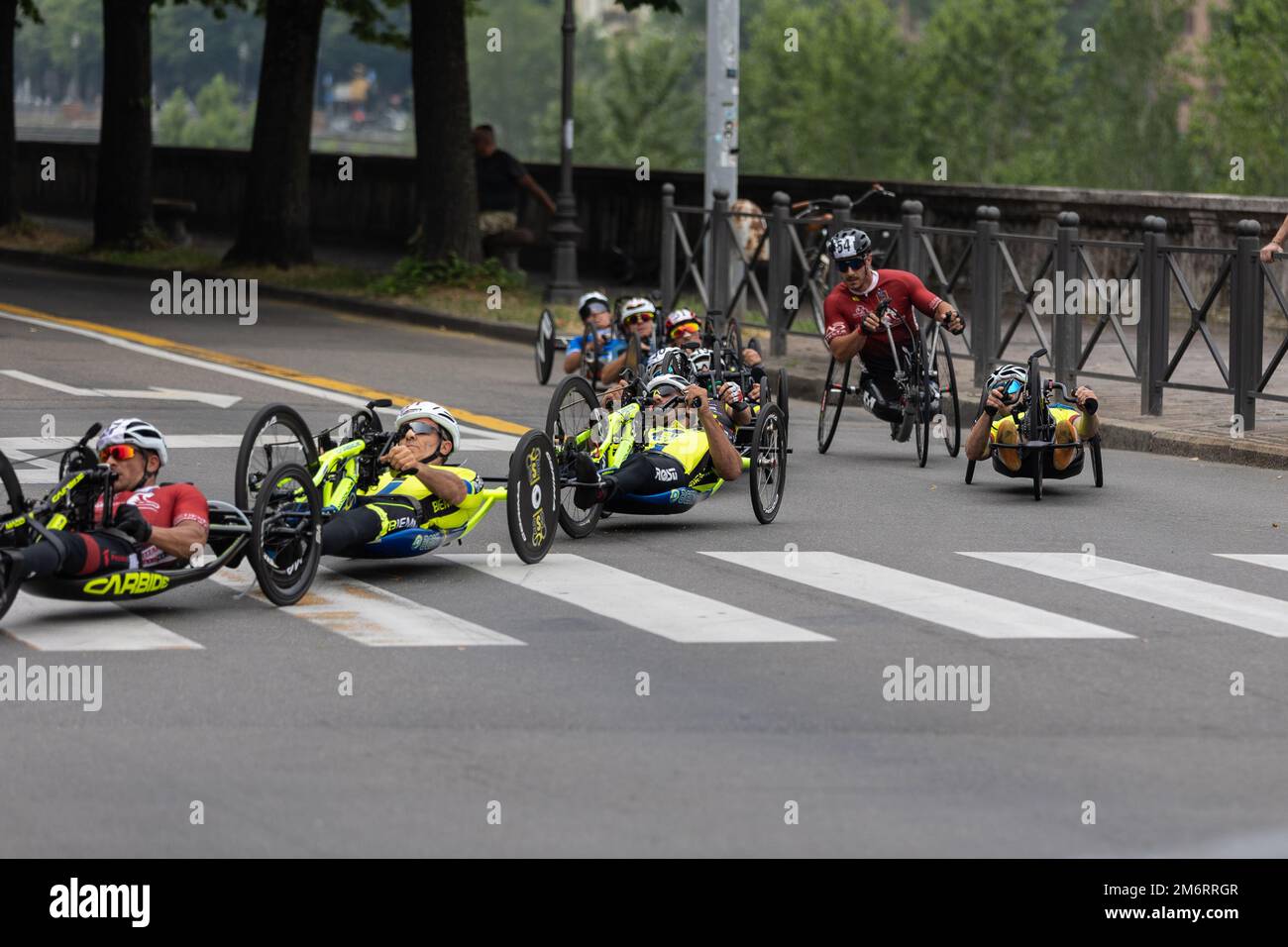 Group of Athletes with Their Special Bikes on a City Track in a Race ...