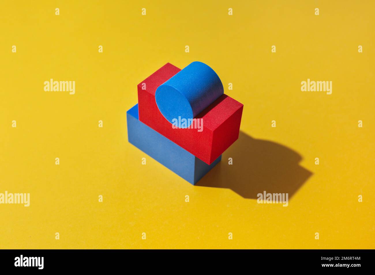 Abstract colored geometric shape red and blue on yellow background ...