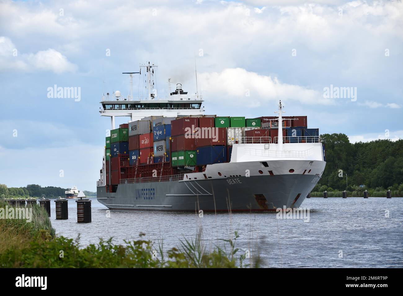 Container ship sailing in the Kiel Canal, Schleswig-Holstein, Germany ...