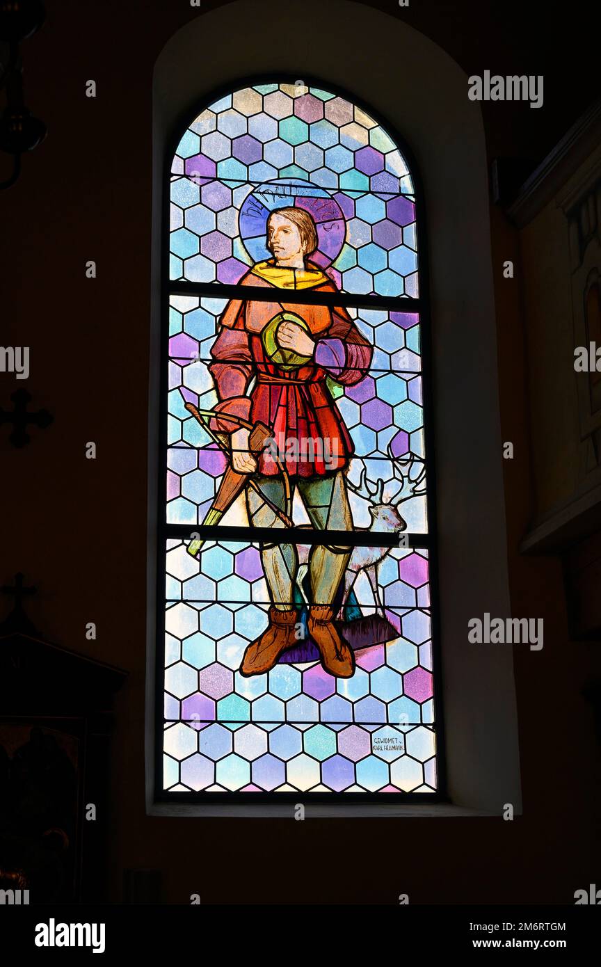 Coloured church window with St. Hubertus n the church of Our Lady ...